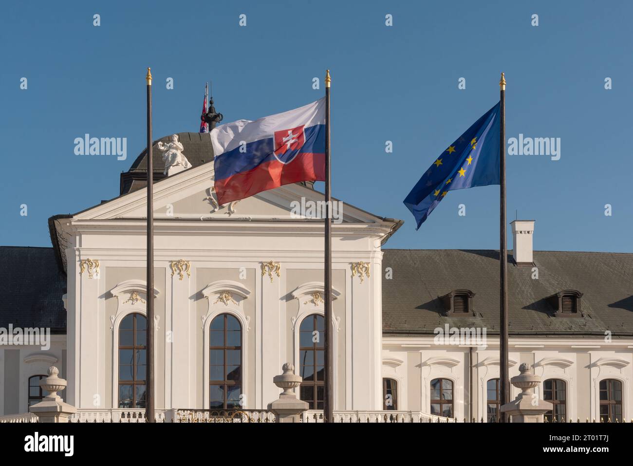 Slovak and EU flags fly outside the Grassalkovich Palace, an official ...