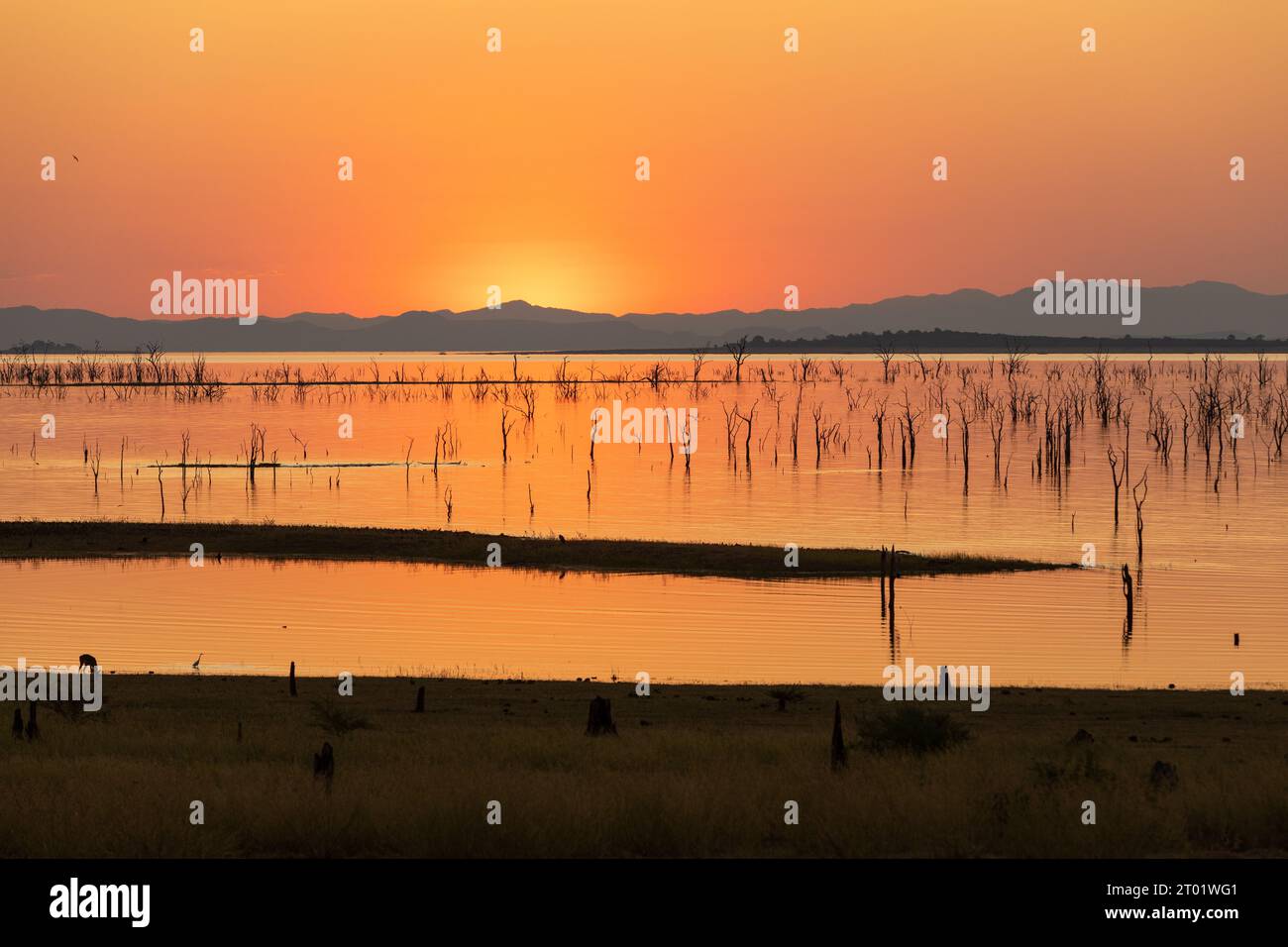 A beautiful sunset over Lake Kariba in Zimbabwe, taken from the ...