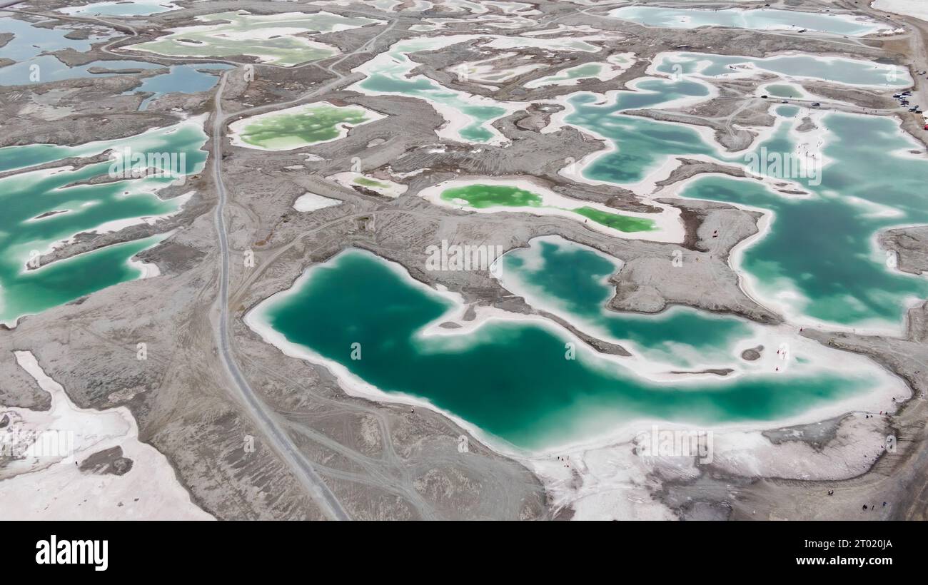 An aerial view of the vast expanse of salt lakes near Mangya Emerald ...
