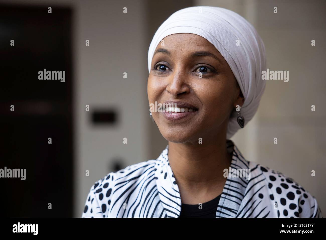 Rep. Ilhan Omar (D-Minn.) speaks with reporters as she departs a House ...