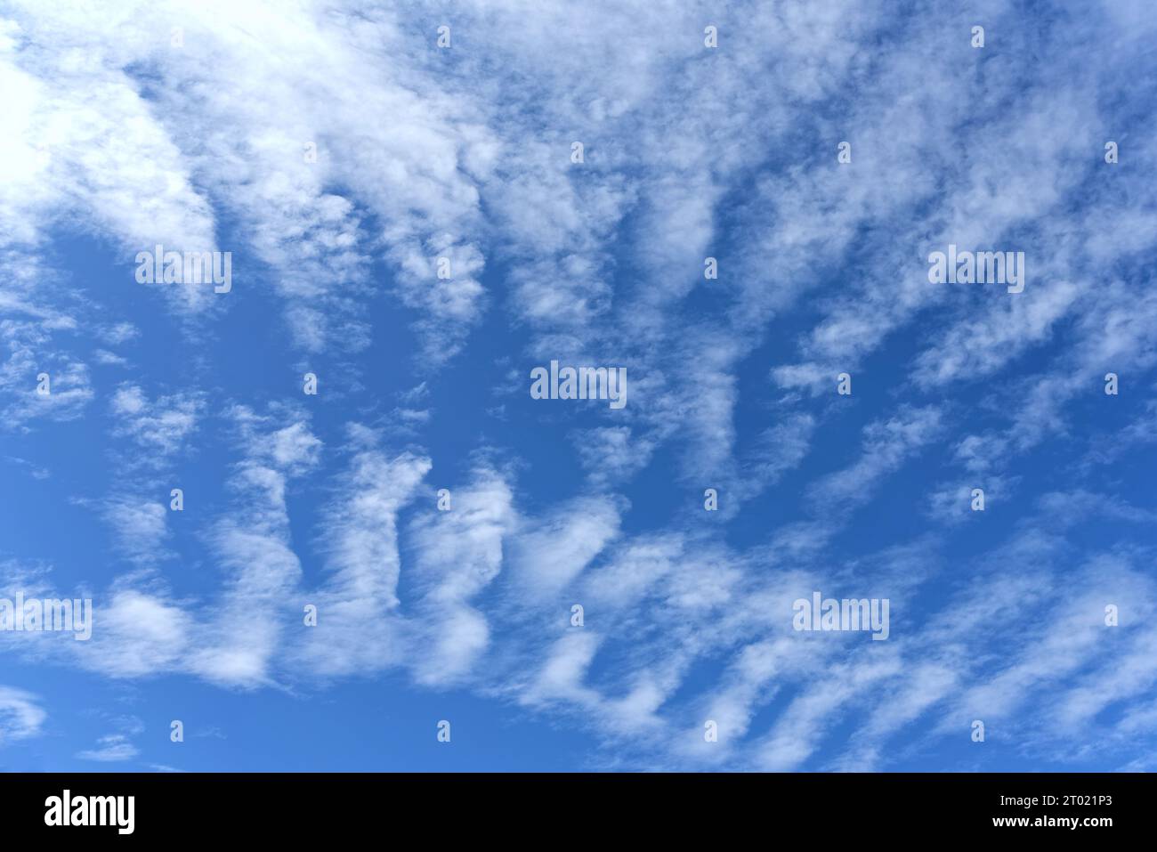 Altocumulus undulatus clouds forming a ripple effect pattern Stock ...