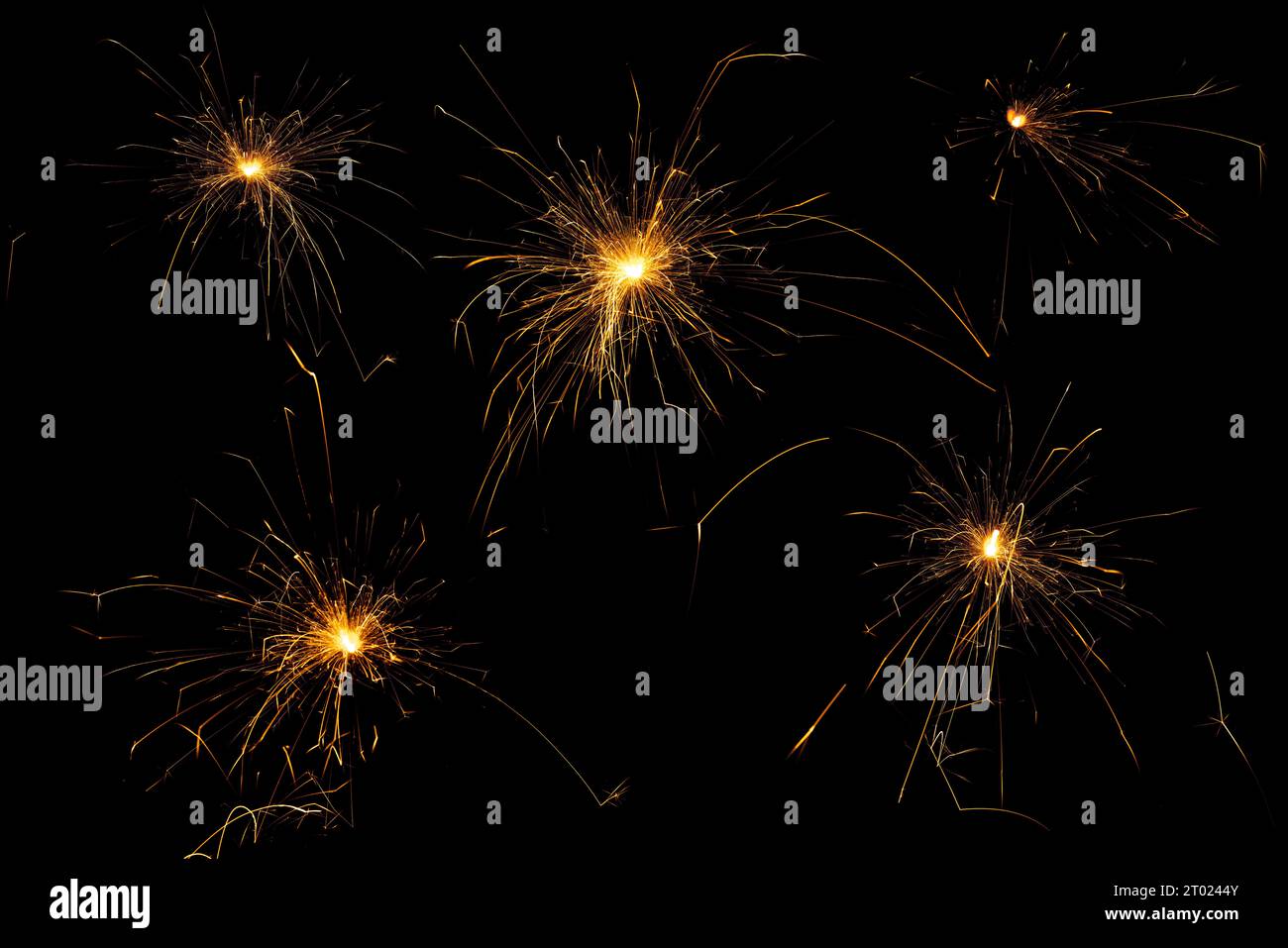 Sparkling burning sparkler on a black background. Isolated burning ...