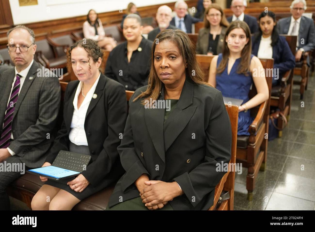 New York, USA. 03rd Oct, 2023. Former President Donald Trump sits in ...