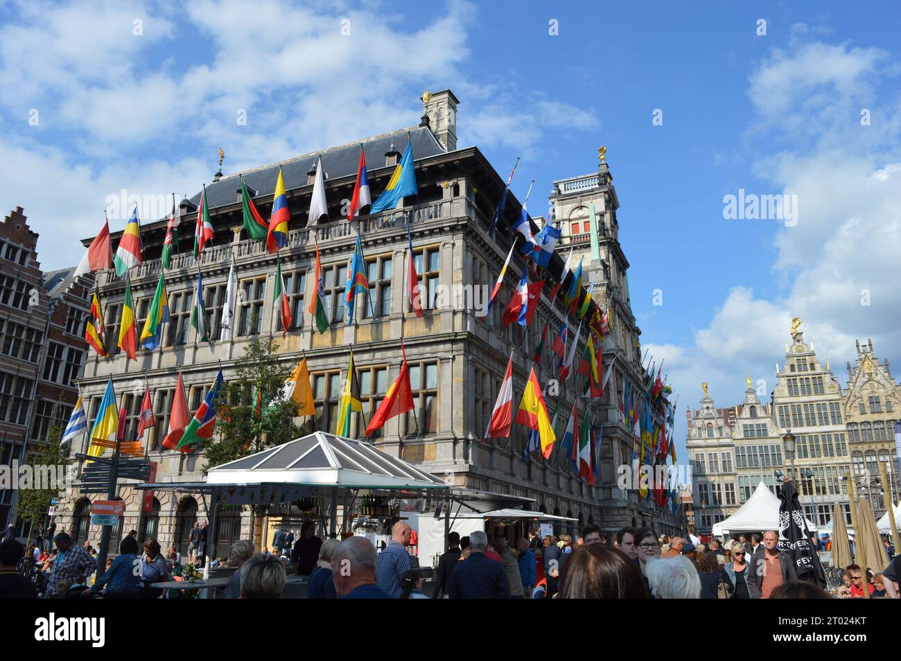 Antwerp City Hall covered in European flags Stock Photo - Alamy