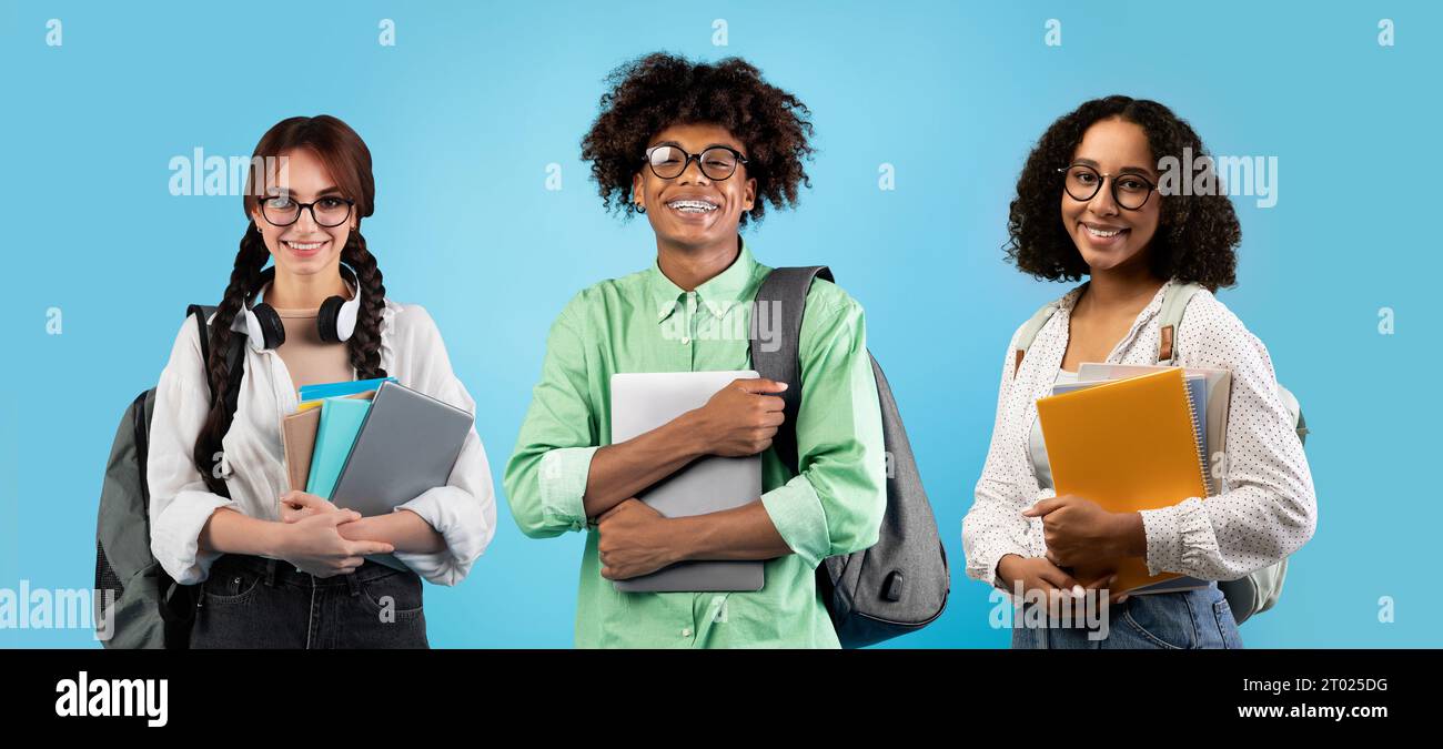 Leaning Concept. Group Of Multiethnic Students Posing Over Blue ...