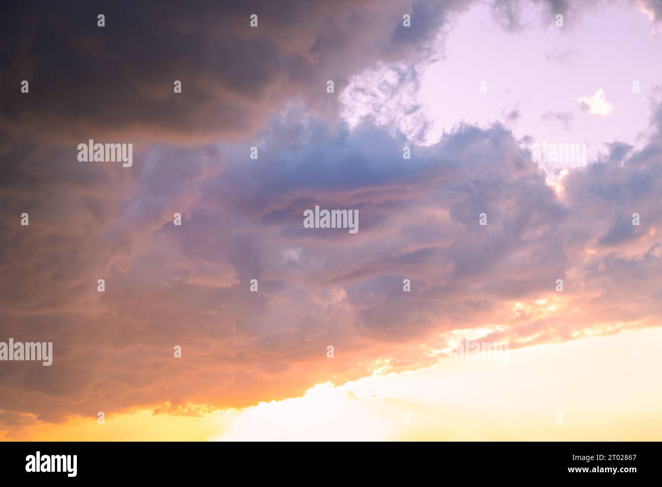 Thick multi-colored cumulus clouds in the sky after rain Stock Photo ...