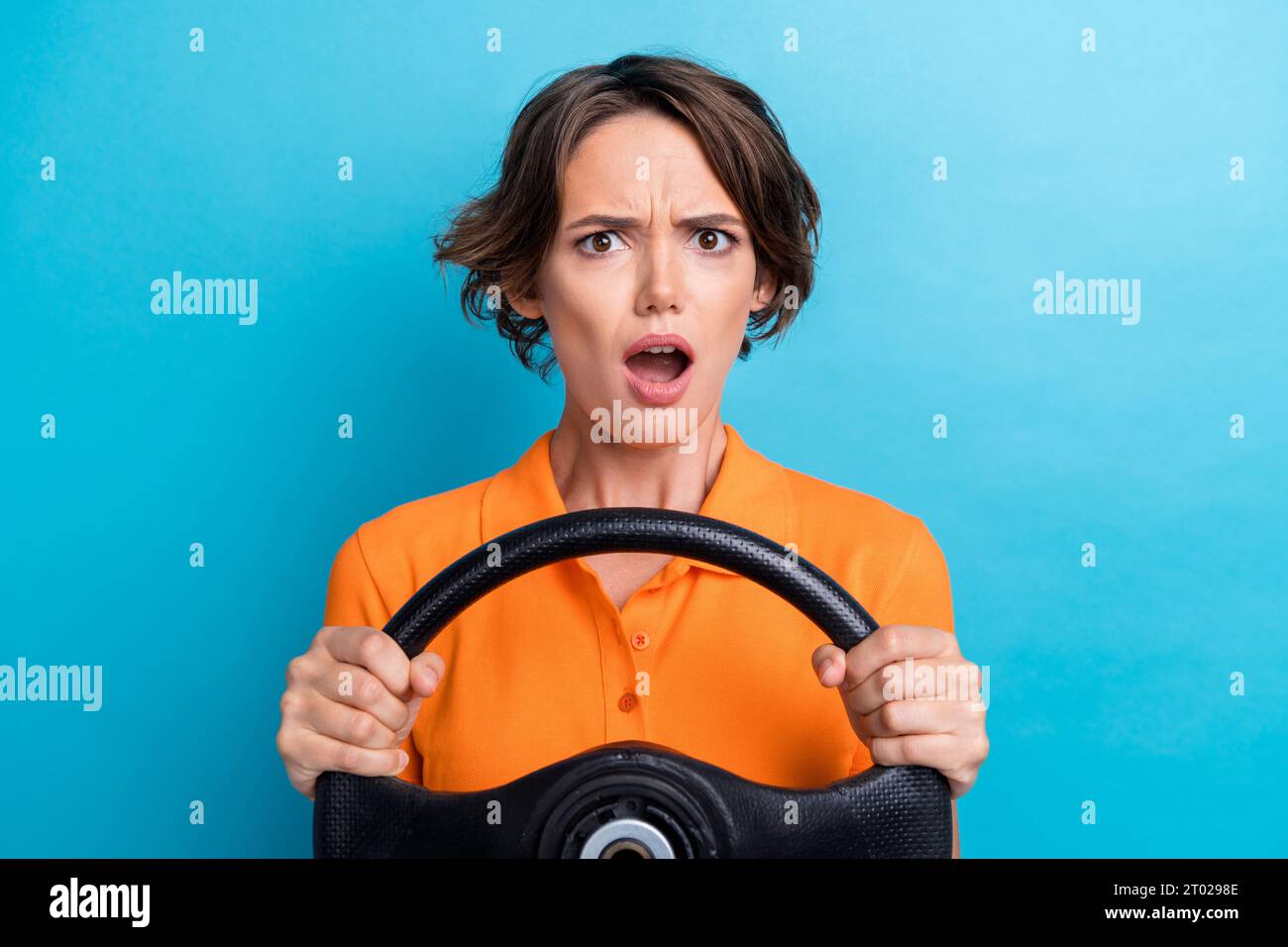Photo of scared shocked girl dressed orange polo riding auto stuck in ...