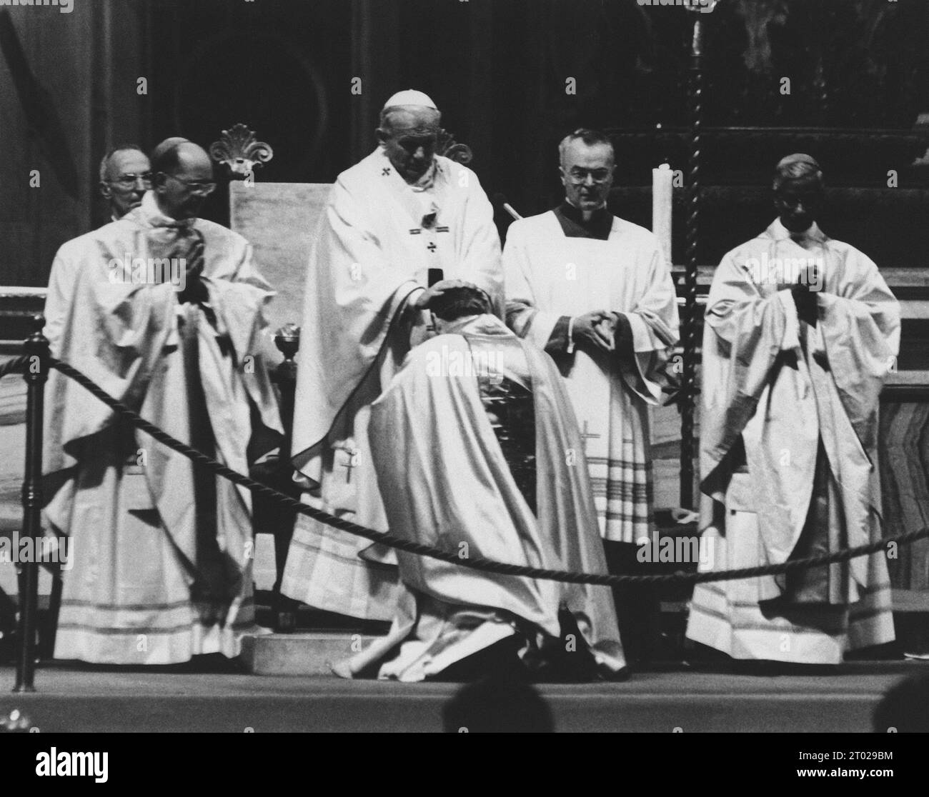 In this Handout from the U.S. Navy, Pope John Paul II, center, "Lays ...