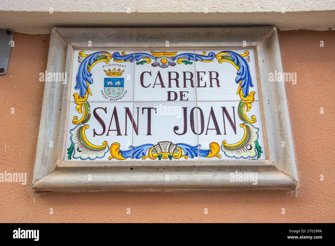 Street name written in calligraphy on a ceramic tile in Spain Stock ...
