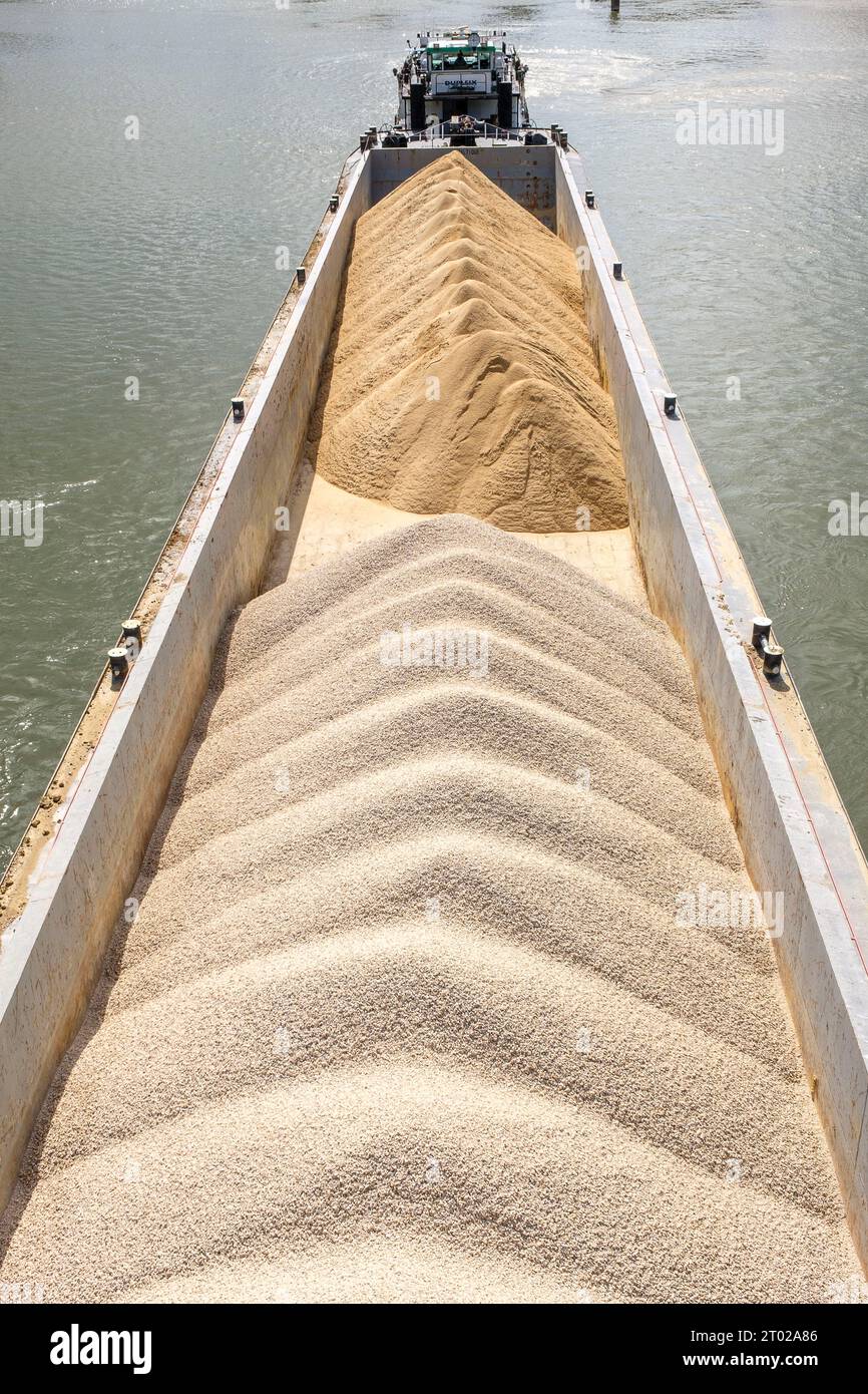 Sand quarry and waterways transportation of the sand. River transport ...