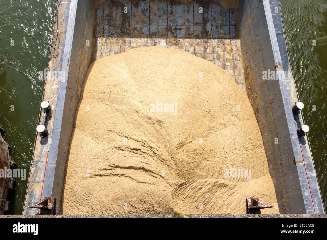 Sand quarry and waterways transportation of the sand. River transport ...