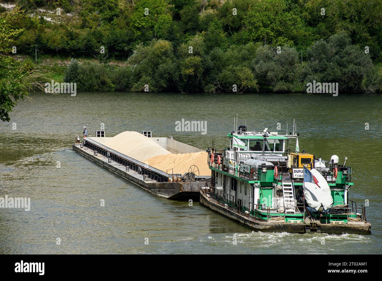 Sand quarry and waterways transportation of the sand. River transport ...