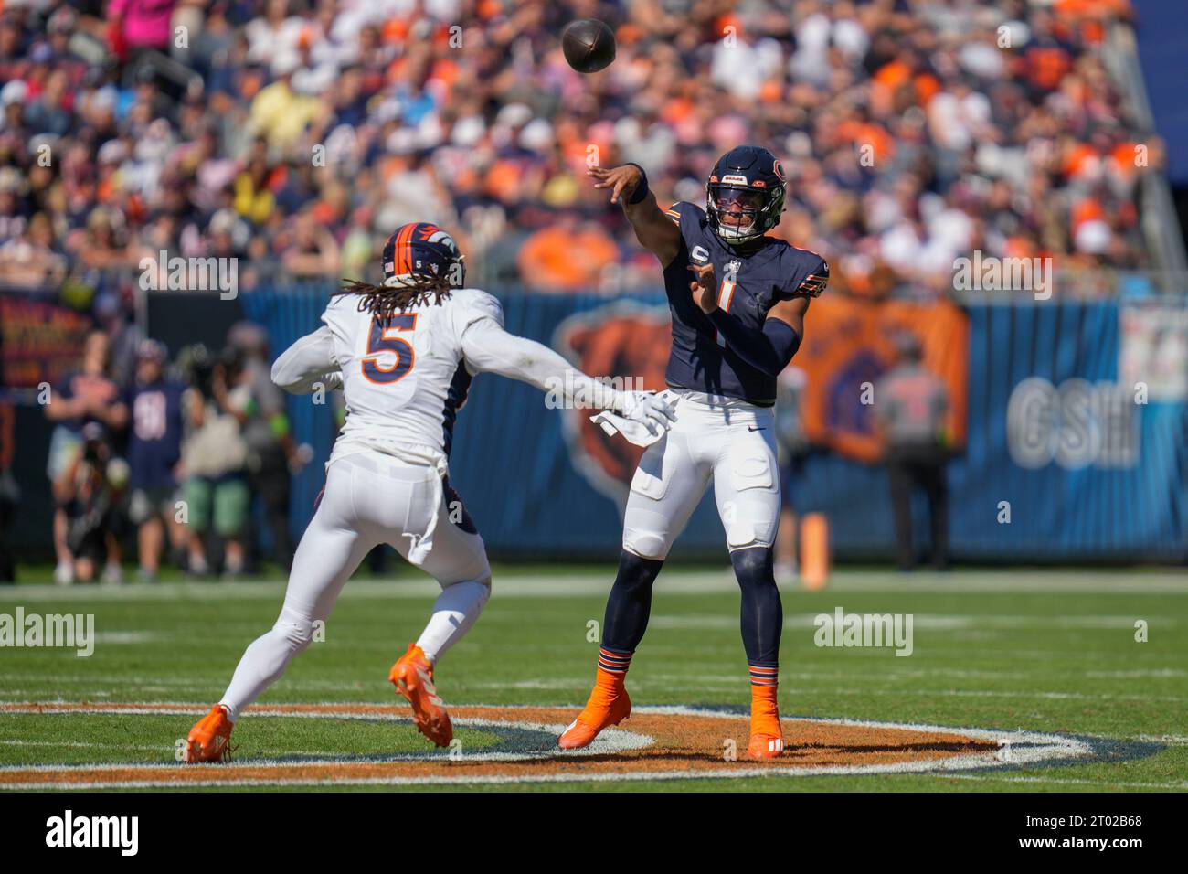 Chicago Bears quarterback Justin Fields (1) throws a pass as Denver ...