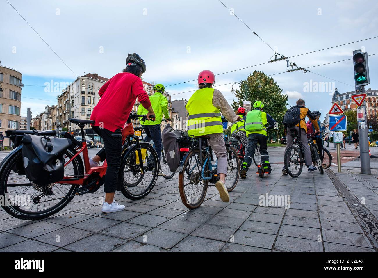 Going to work or to school with the bicycle with family - Biking on the ...