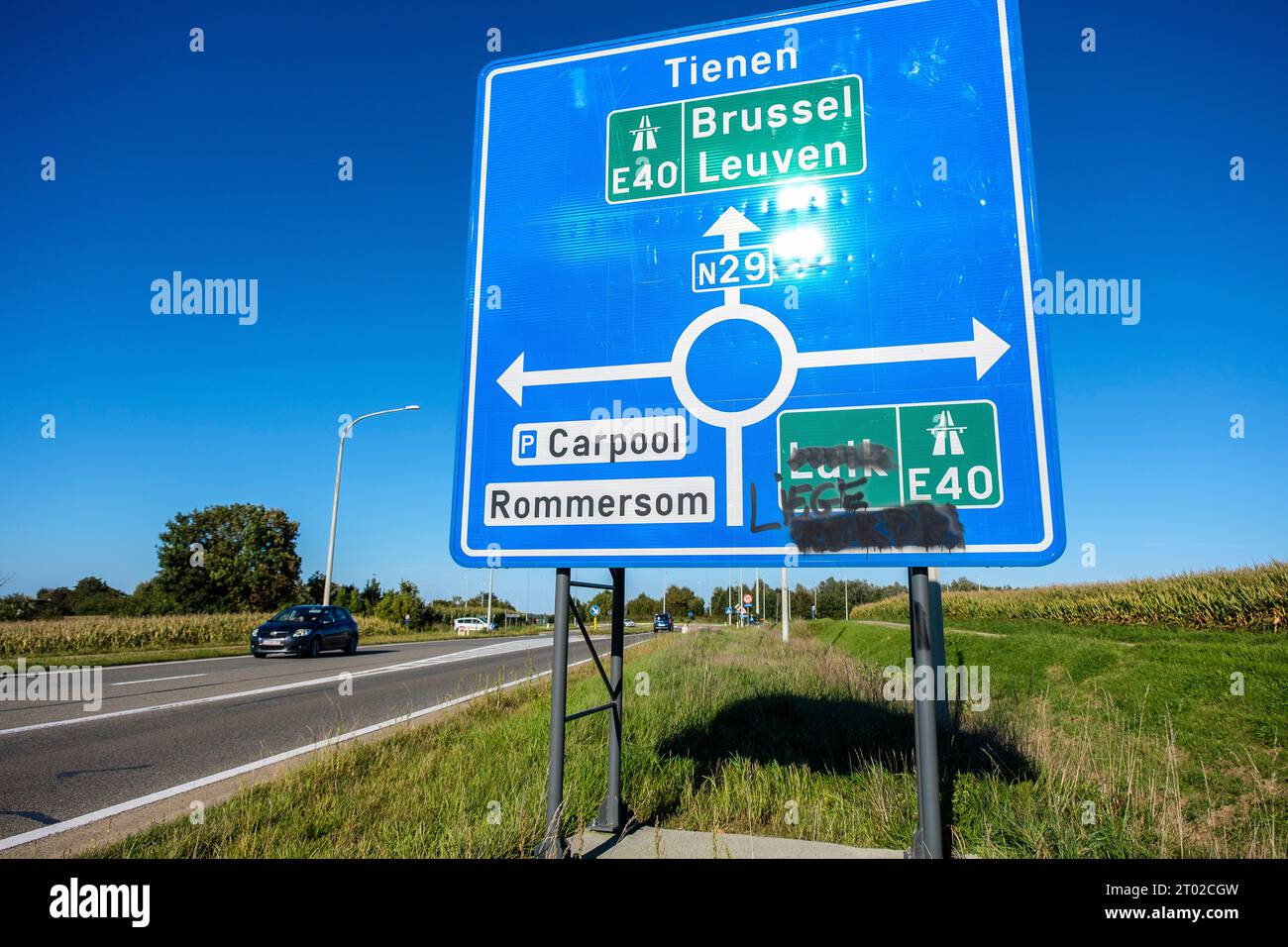 Regional road sign in flemish with direction arrow to Liege ...