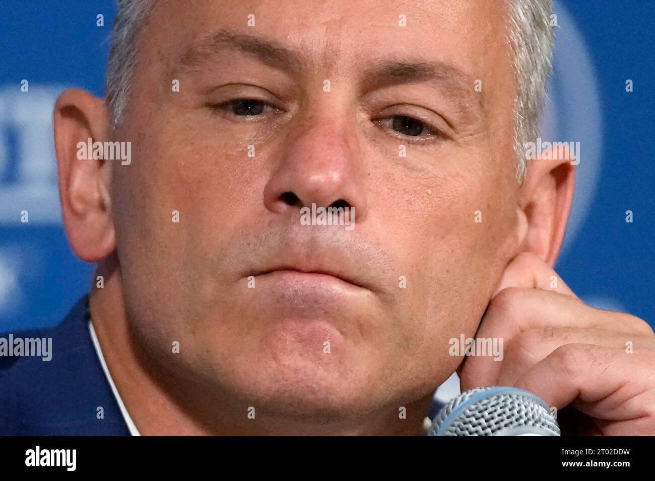 Chicago Cubs president of baseball operations Jed Hoyer listens to a ...