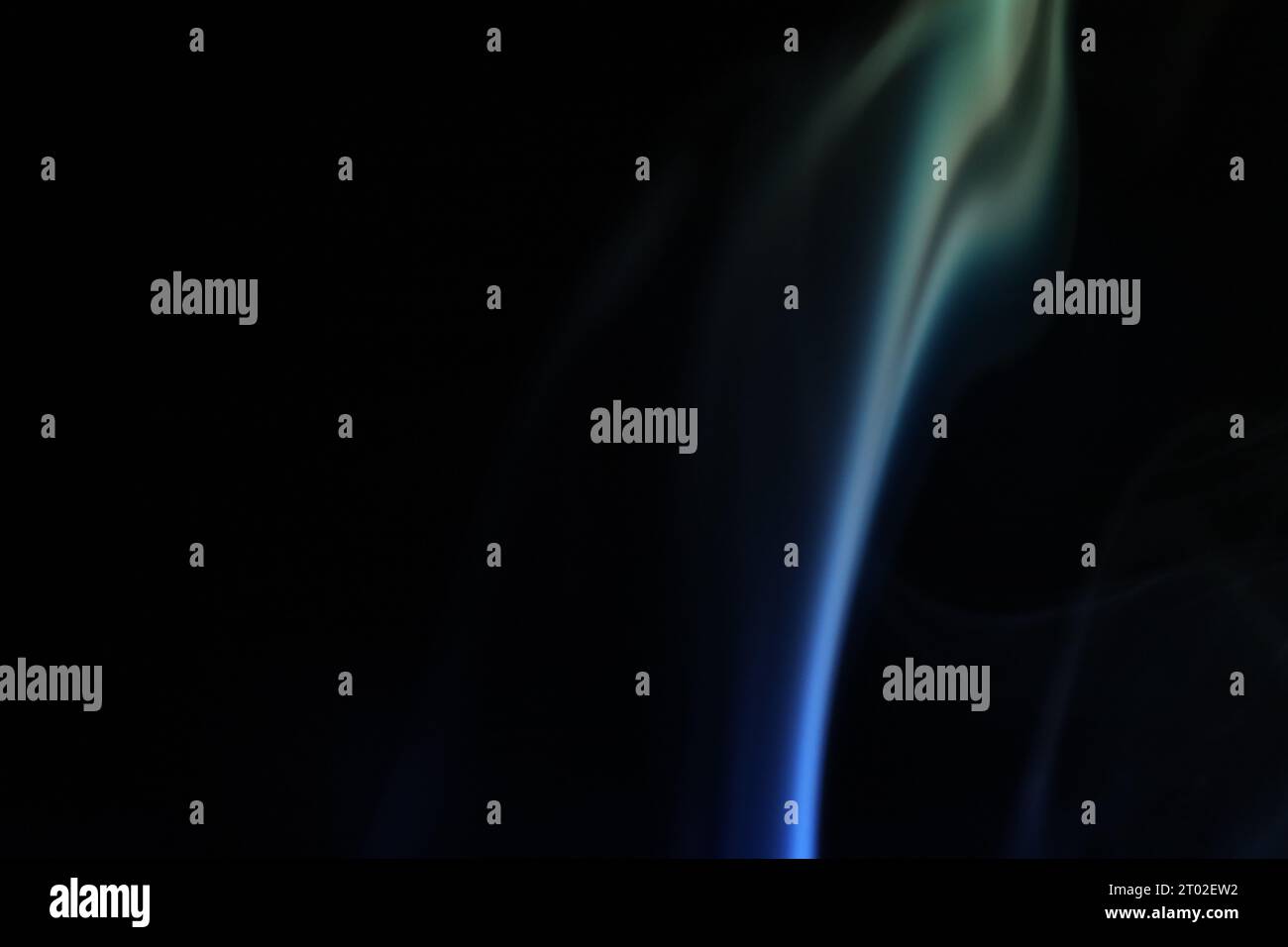 Yellow and blue smoke on a dark background, colourful abstract, blue ...