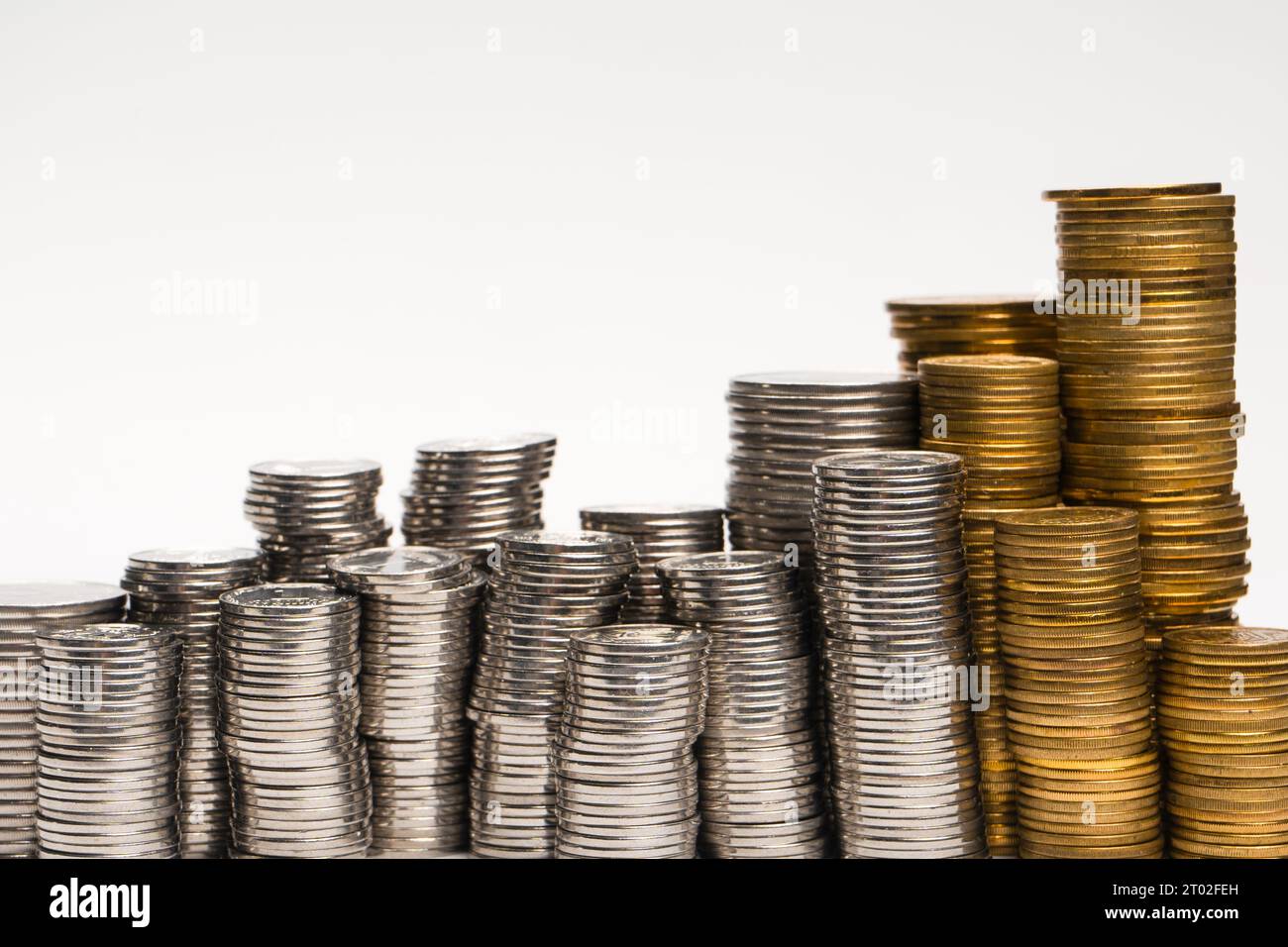 Pile of coins isolated on a white background. Banking and money Stock ...