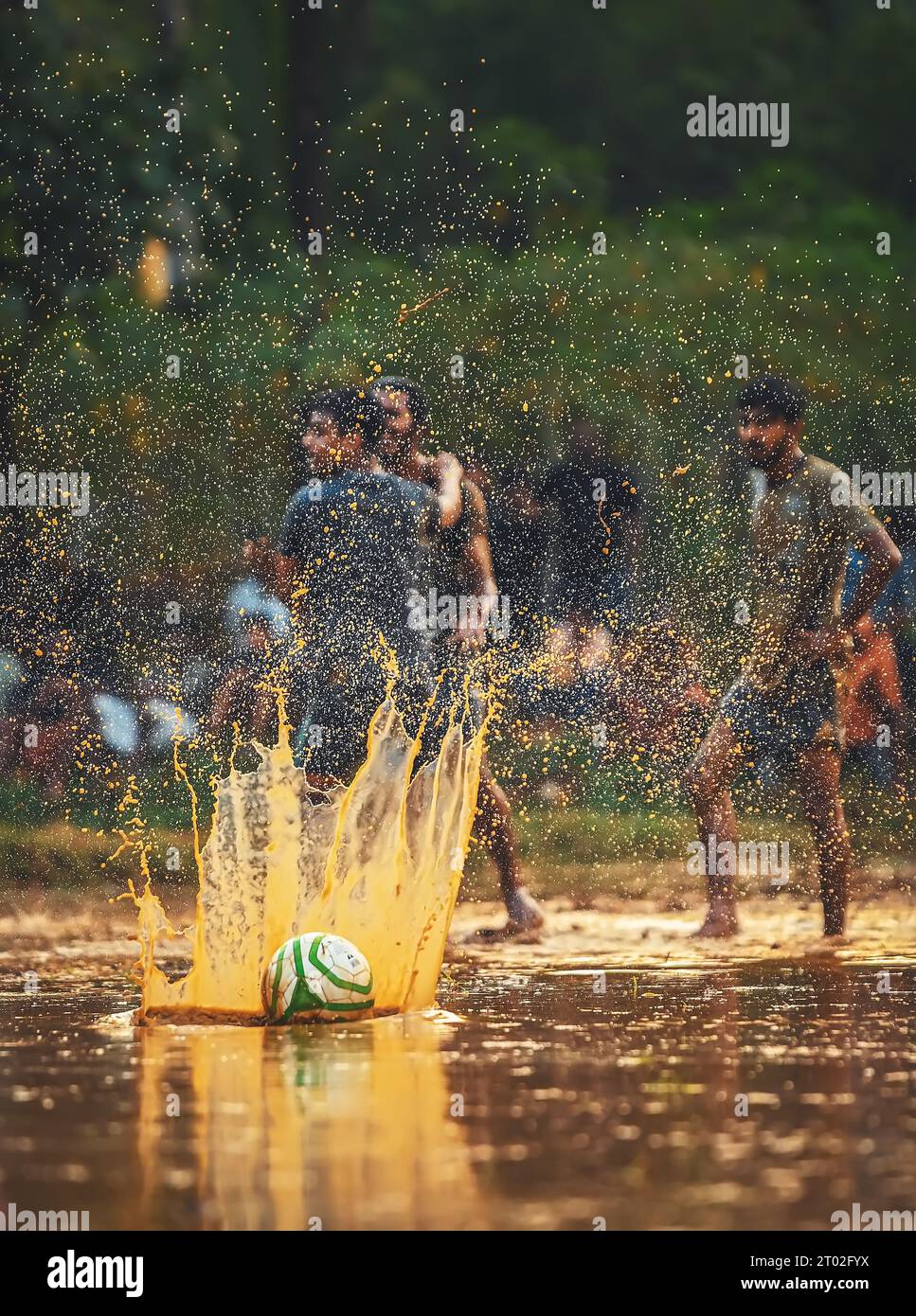 Playing Mud Football, water splashing, highspeed photography Stock ...