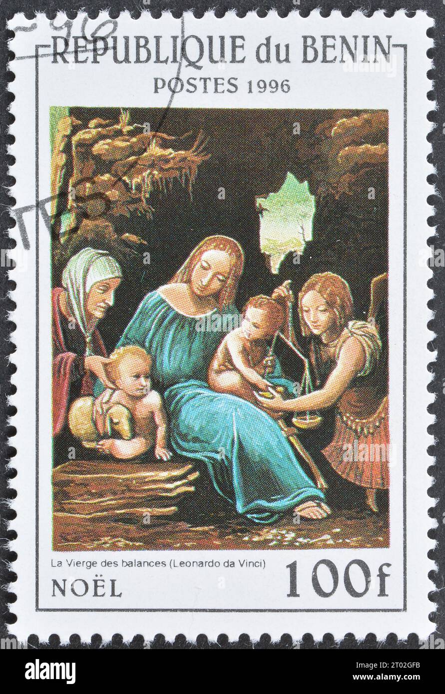 Cancelled postage stamp printed by Benin, that shows Virgin Mary and ...
