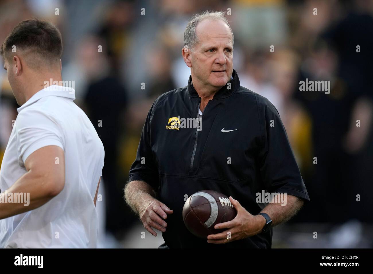 Iowa defensive coordinator Phil Parker walks on the field before an ...