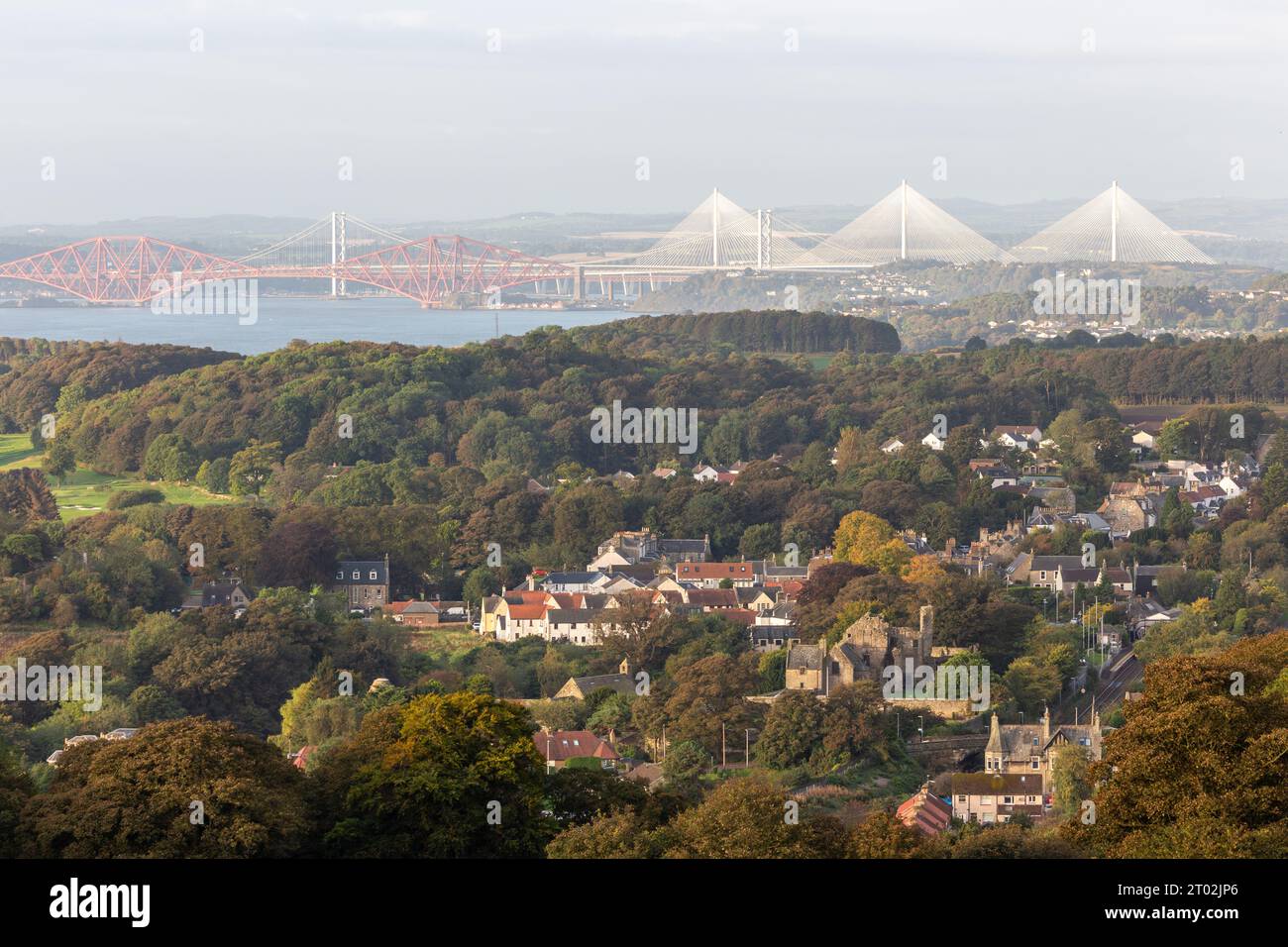 The picturesque village of Aberdour in Fife with the Forth Bridges in ...