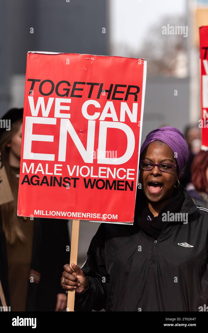 Protester at a Million Women Rise protest against male violence towards ...