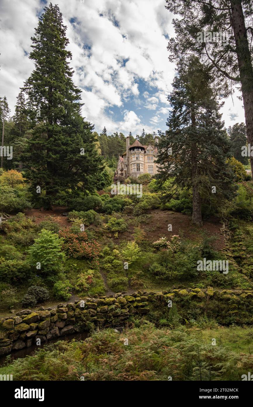 Cragside House with massive trees & its rock garden descending into a ...
