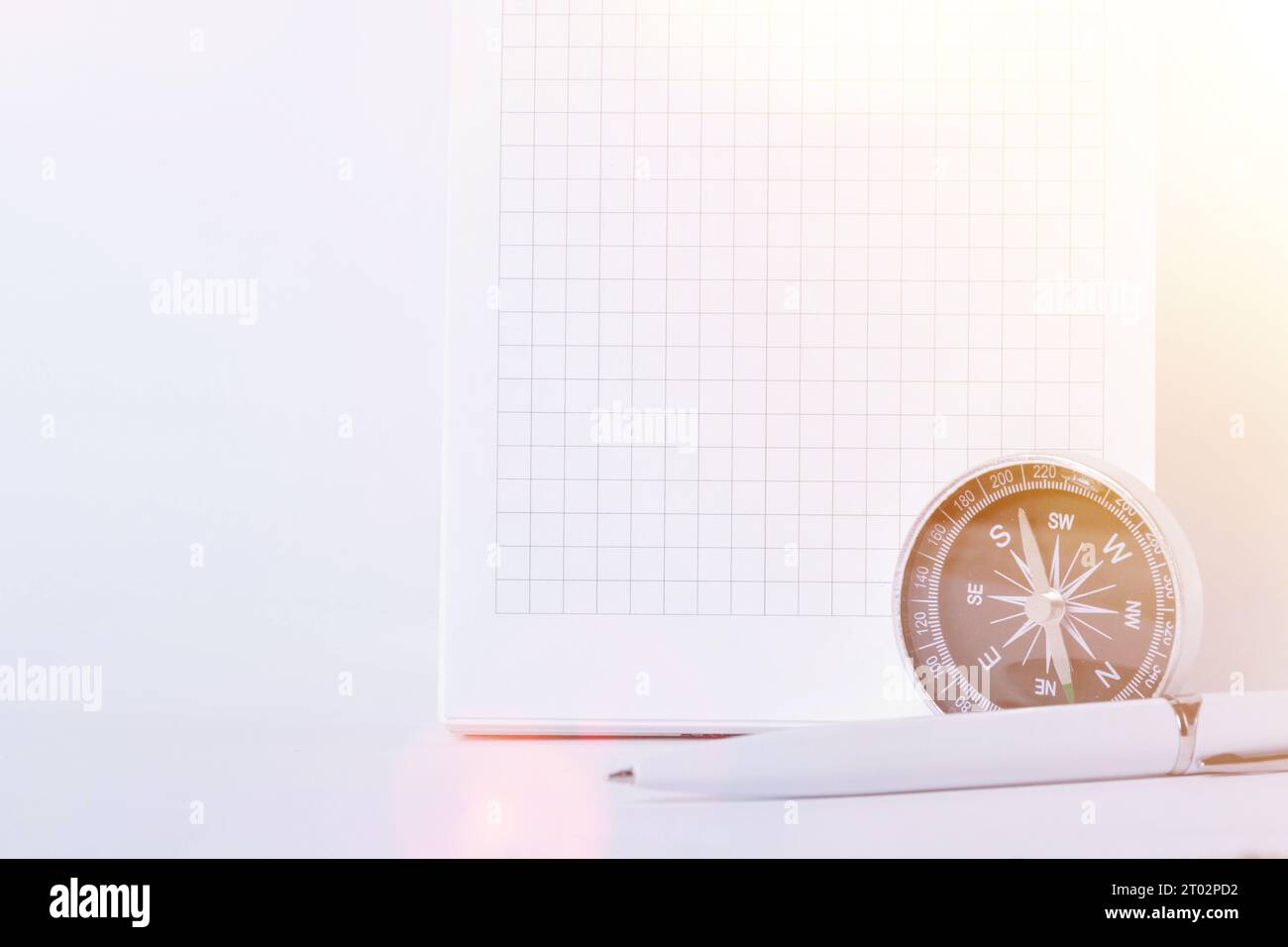 Traveler's notes. A clean notebook with a pen for writing a compass and ...