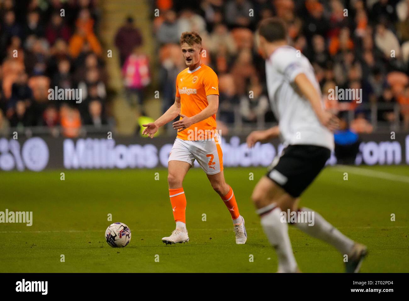 Callum Connolly #2 of Blackpool looks upfield during the Sky Bet League ...