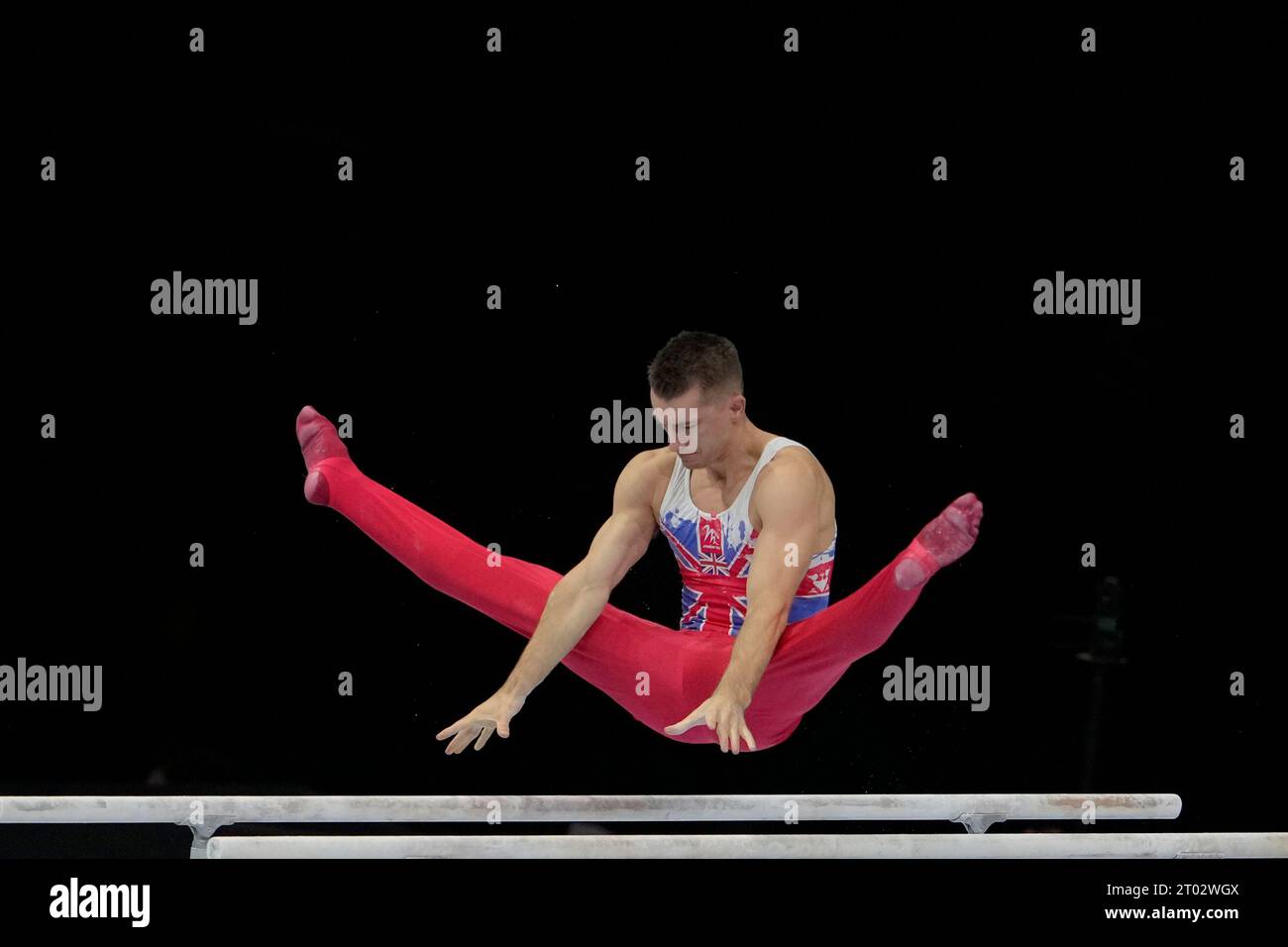 Great Britain's Max Whitlock competes on the parallel bars during the ...