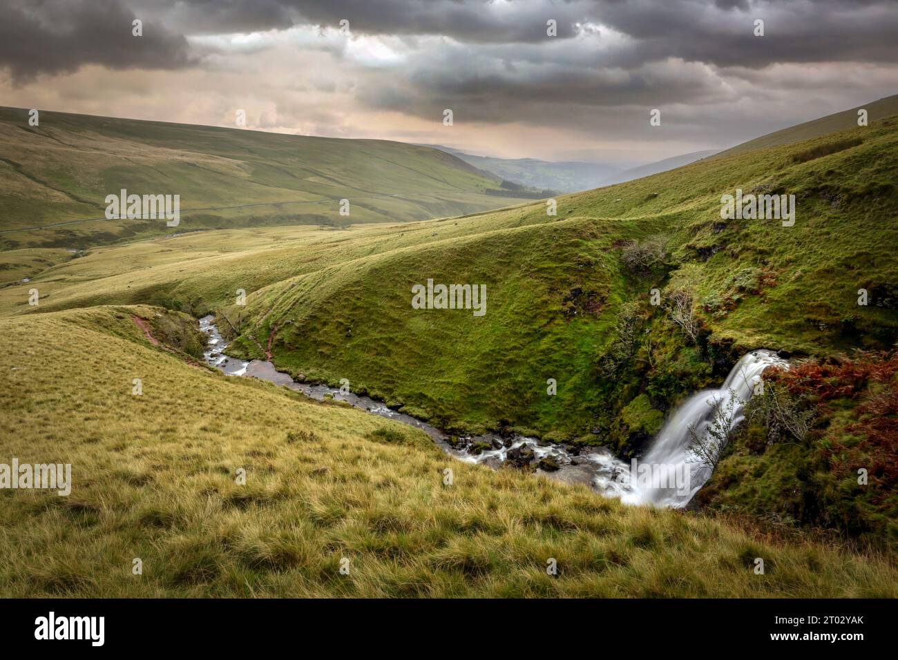 Heavy weather over one of a series of waterfalls that roll down the ...
