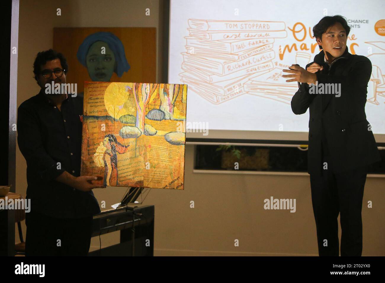 EDITORIAL USE ONLY Artist Majid Adin (left) and auctioneer Nick Yau ...