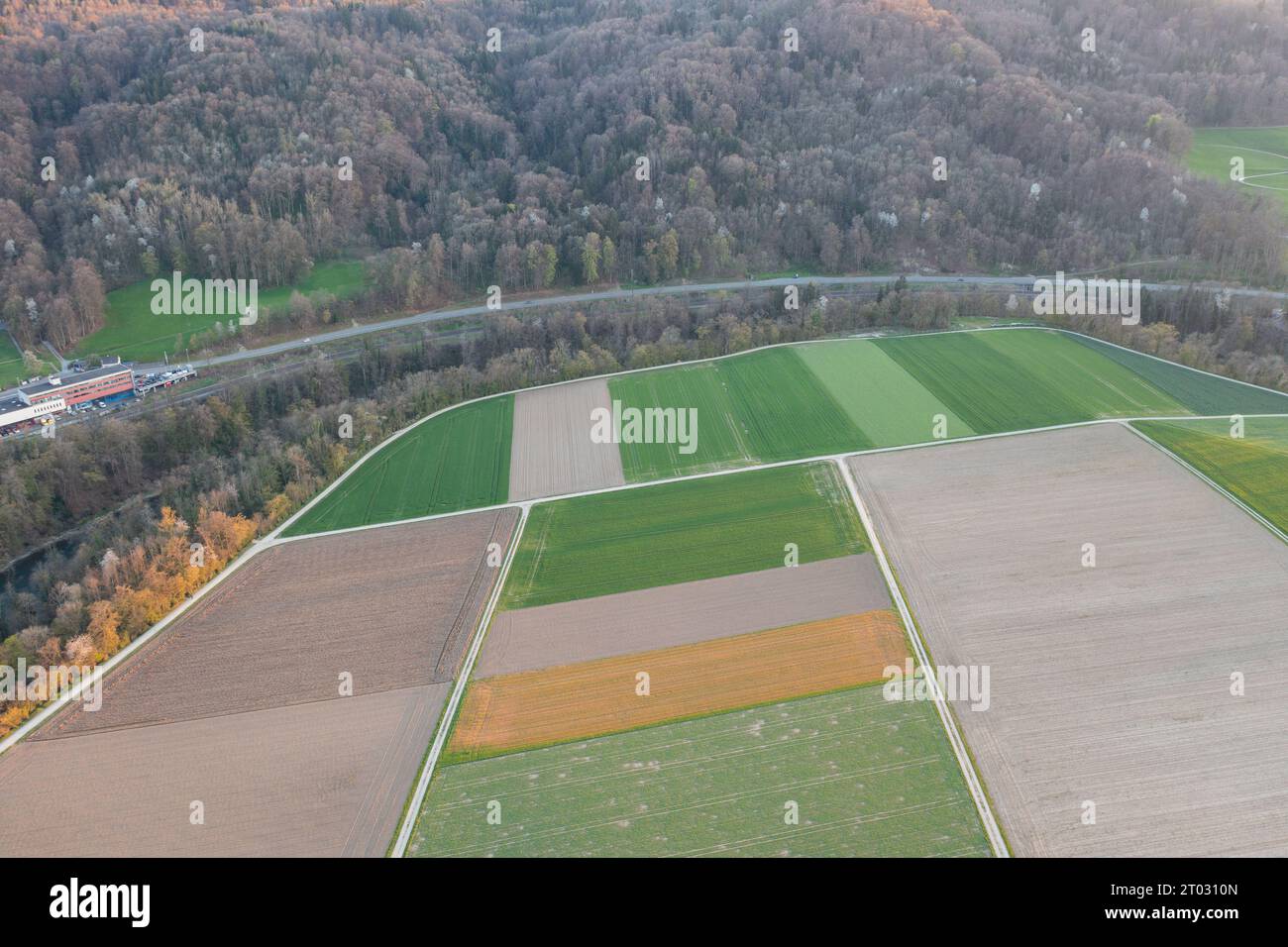 Nice village with many fields where farmers grow crops for the people ...