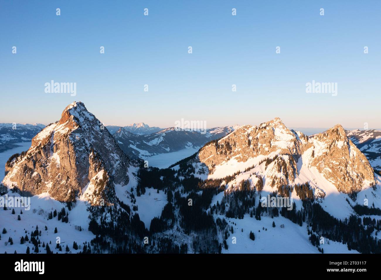 Epic drone photo of a sunrise in the Swiss mountains around a big ...