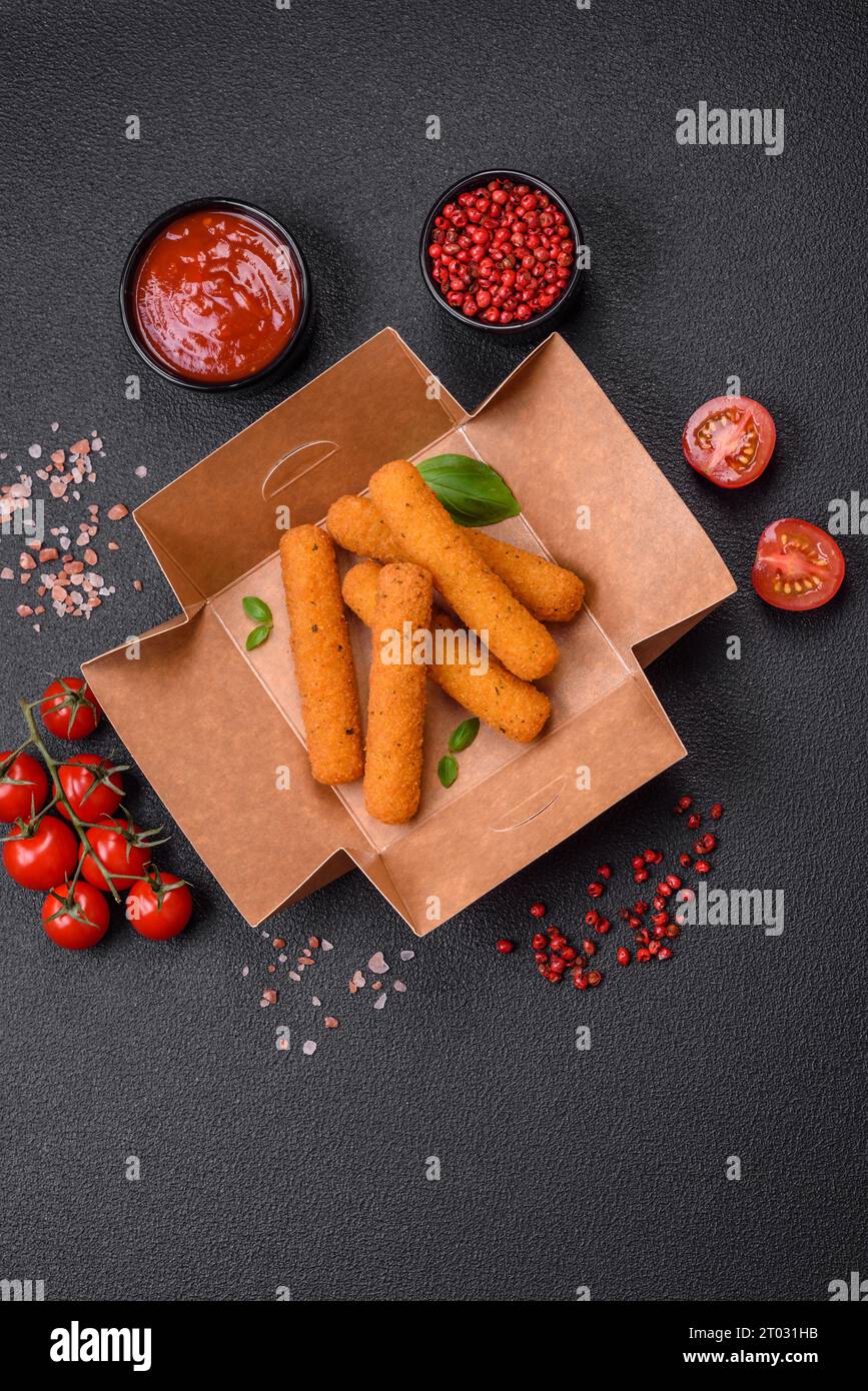 Delicious crispy cheese sticks with mozzarella, salt and spices ...