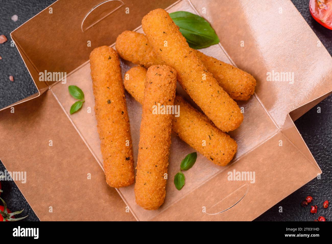Delicious crispy cheese sticks with mozzarella, salt and spices ...