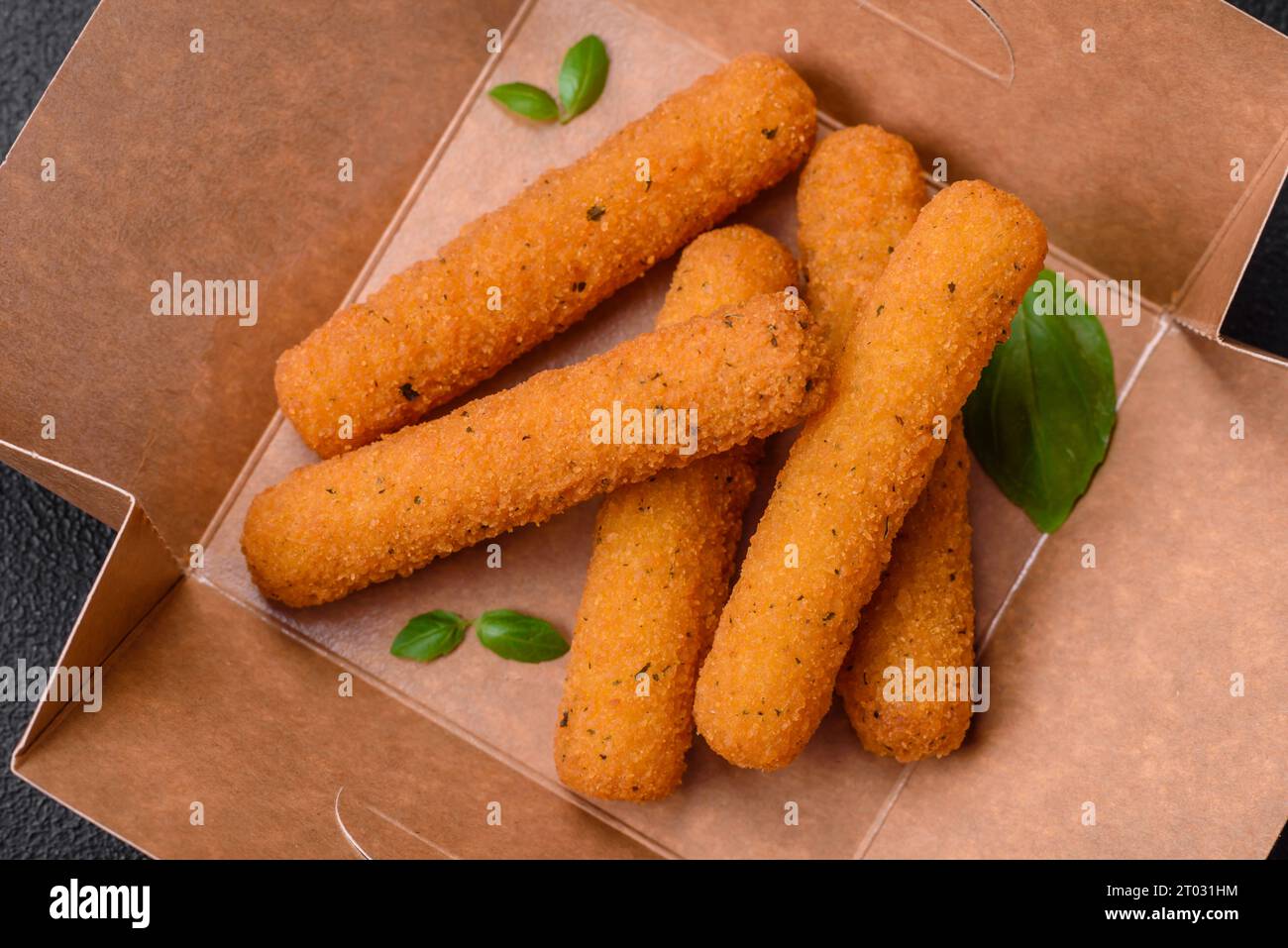 Delicious crispy cheese sticks with mozzarella, salt and spices ...
