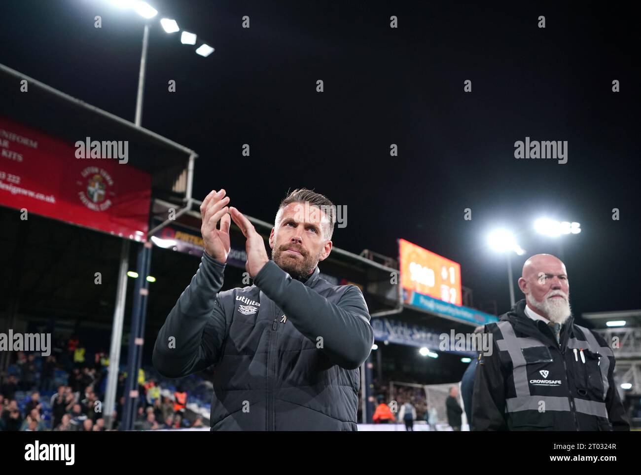 Luton Town manager Rob Edwards applauds the fans following the Premier ...