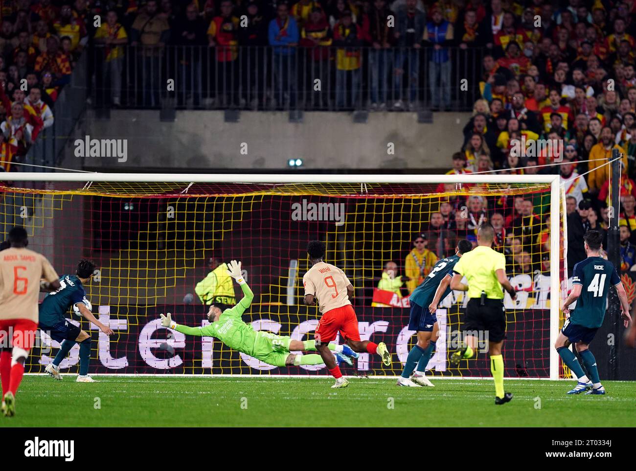 RC Lens' Elye Wahi scores their side's second goal of the game during ...