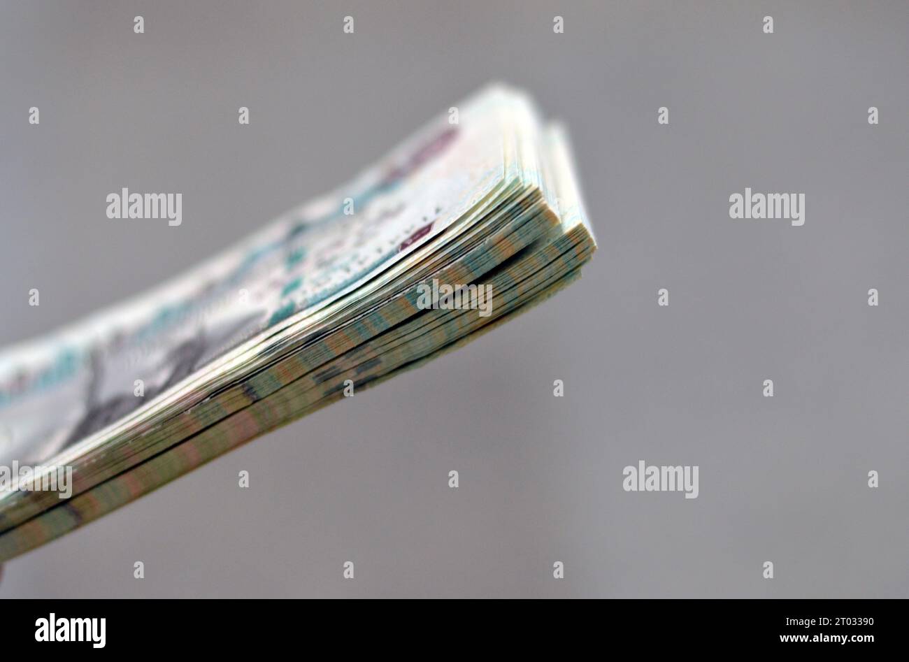 Stack of Egyptian currency of 100 EGP LE 2023 one hundred Egyptian ...