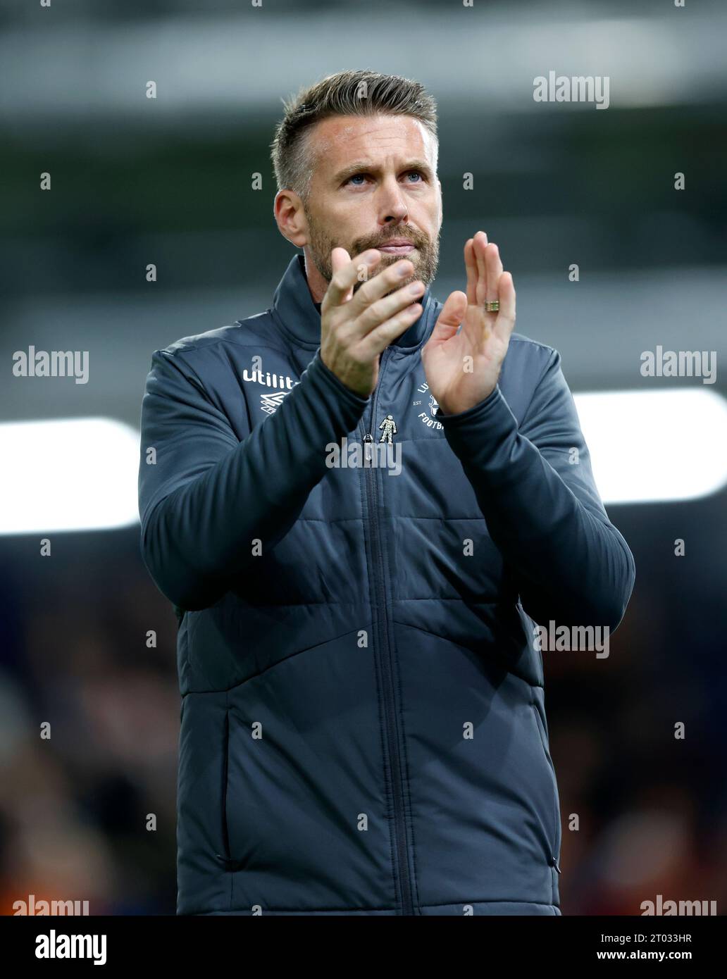 Luton Town manager Rob Edwards applauds the fans following the Premier ...