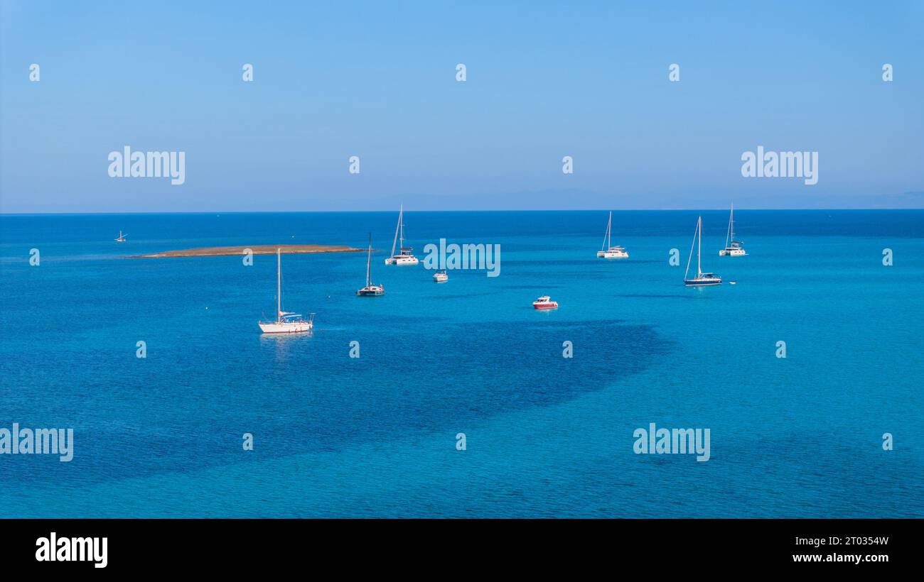 Yachts near the Spiagga La Pelosa beach in the north-west of Sardinia ...