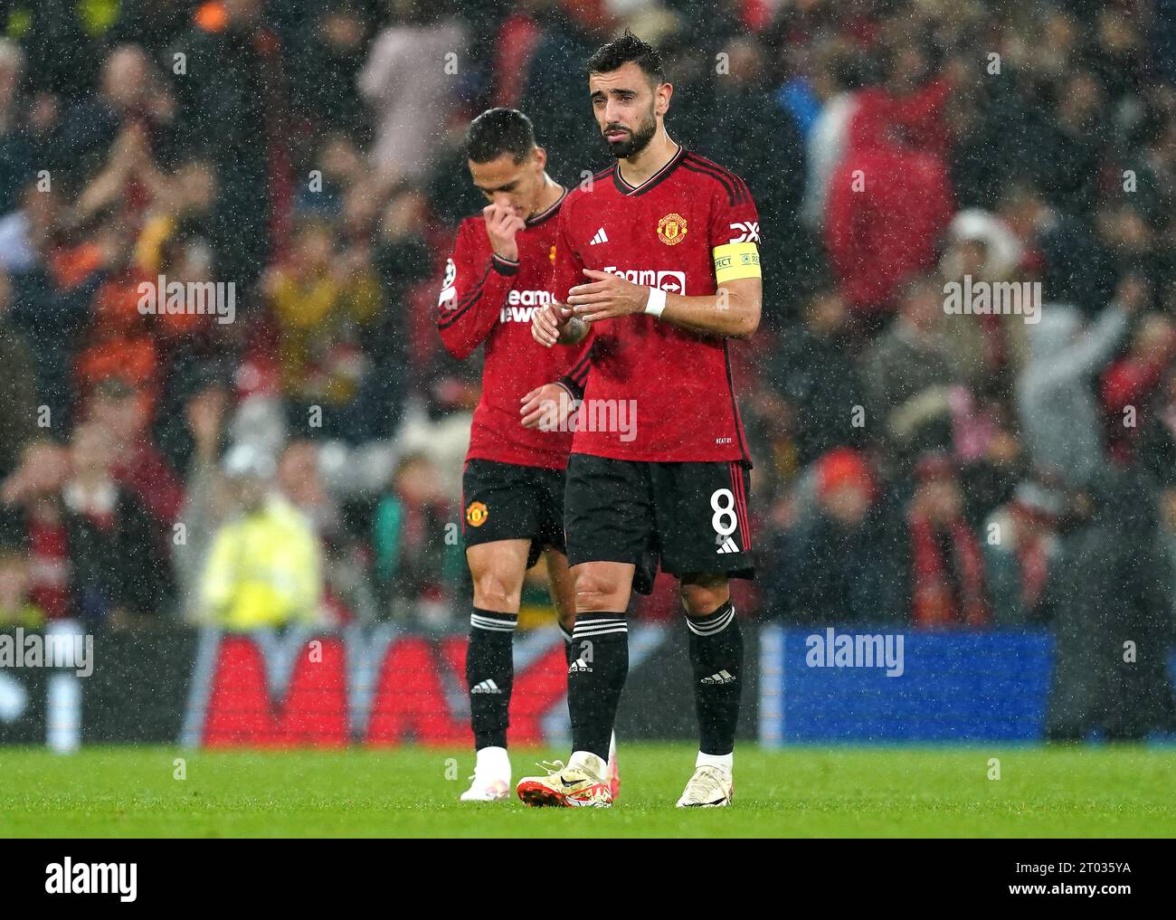 Manchester United's Antony (left) and Bruno Fernandes after the final ...