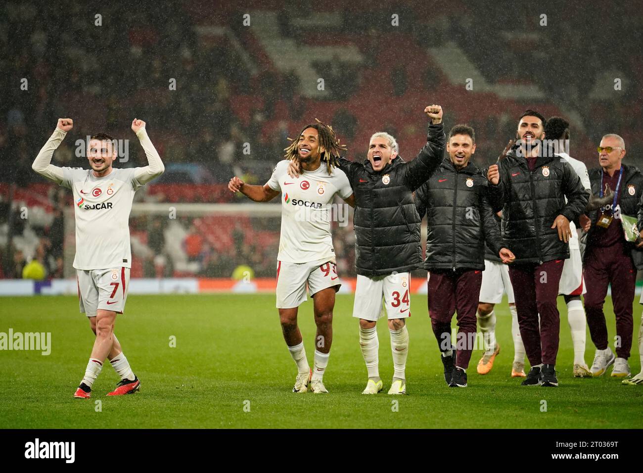 Galatasaray's players celebrate after winning the Champions League group A soccer match between ...