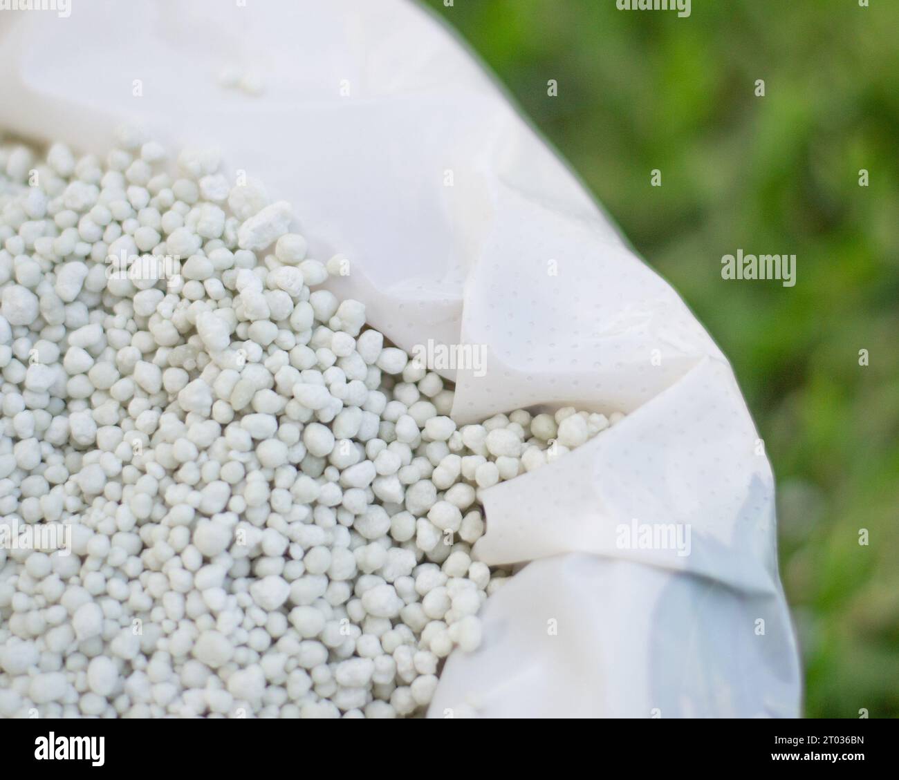 Chemical fertilizer for garden plants and lawns. Garden maintenance ...