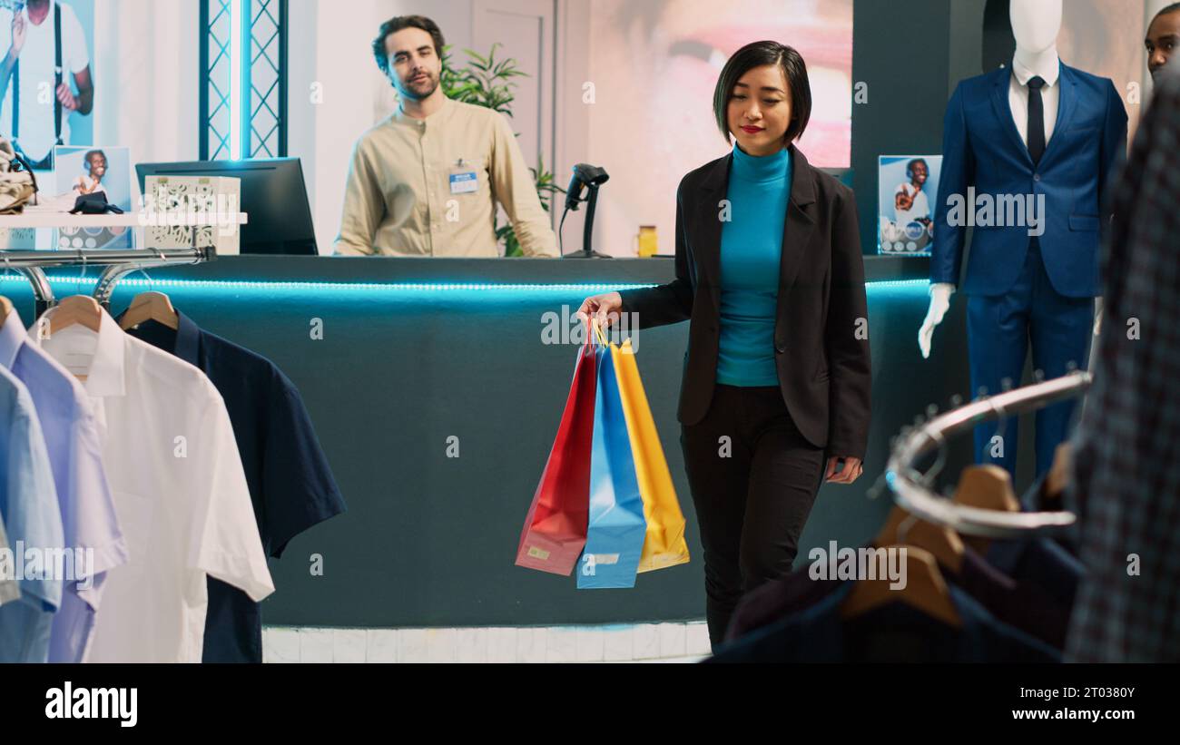 Asian customer doing dance moves hi-res stock photography and images ...