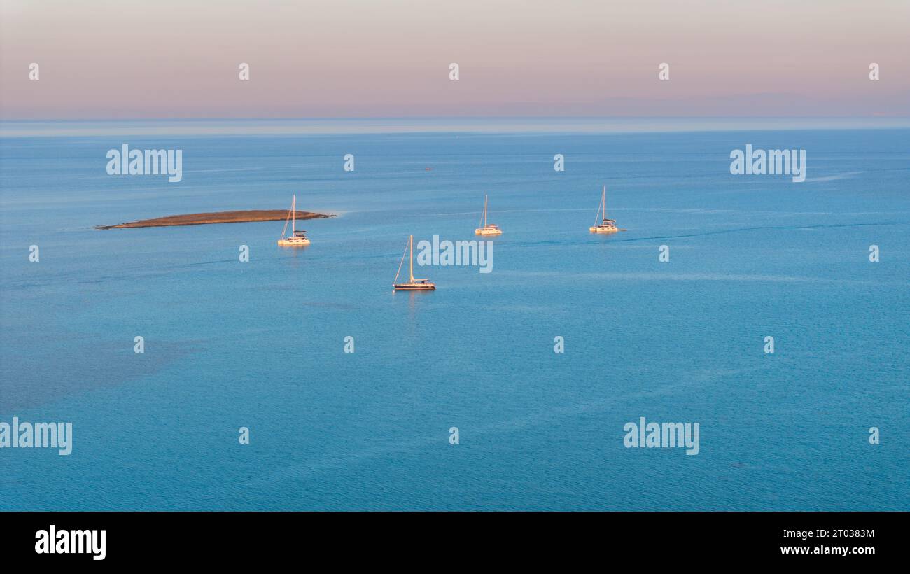 Yachts near the Spiagga La Pelosa beach in the north-west of Sardinia ...