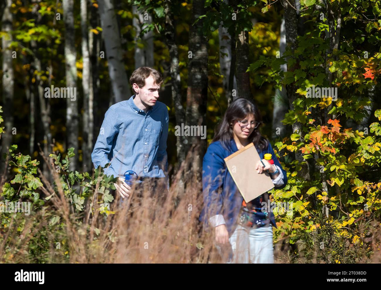 Logan Clegg, left, walks along the Marsh Loop Trail, Tuesday, Oct. 3 ...