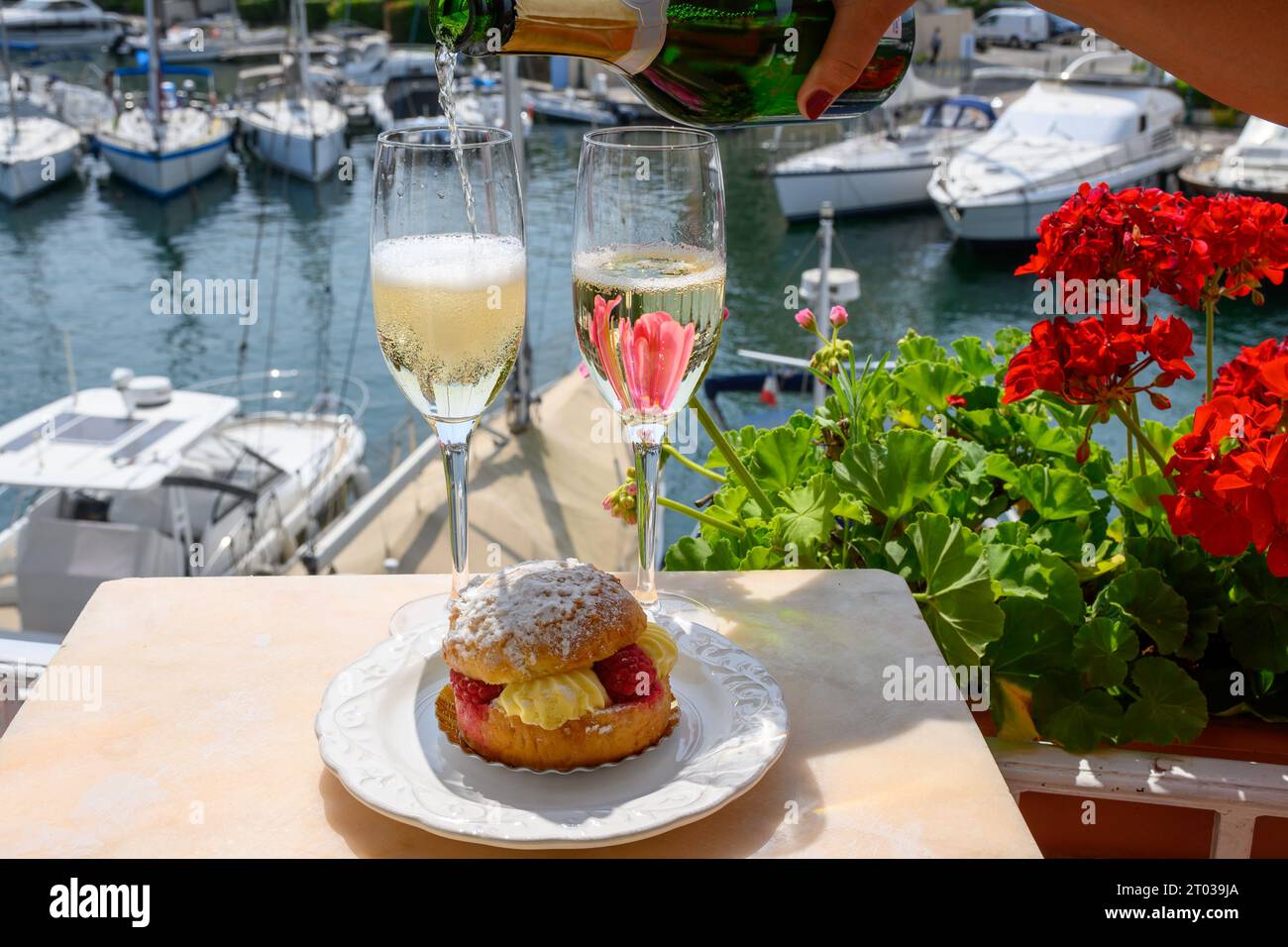 Drinking of French brut champagne sparkling wine with cake Tarte ...